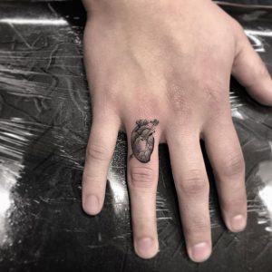 35 of the Best Knuckle Tattoos for Men and Women - TattooBlend