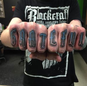 35 of the Best Knuckle Tattoos for Men and Women - TattooBlend